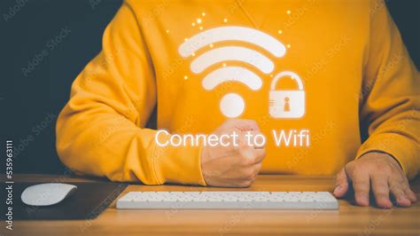 Man Using A Computer Keyboard To Connect To Wifi And Waiting To Loading Digital Business Data
