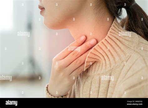 Asian Woman Put On Neck Due To A Sore Throat Female Tonsillitis Causes A Inflammation Treated