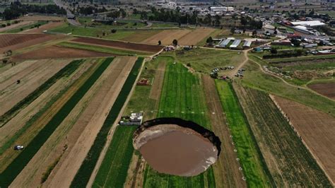 Huge Sinkhole Threatens To Swallow Mexican Home
