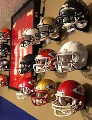 Customer Displays Of Nfl And College Football Helmets