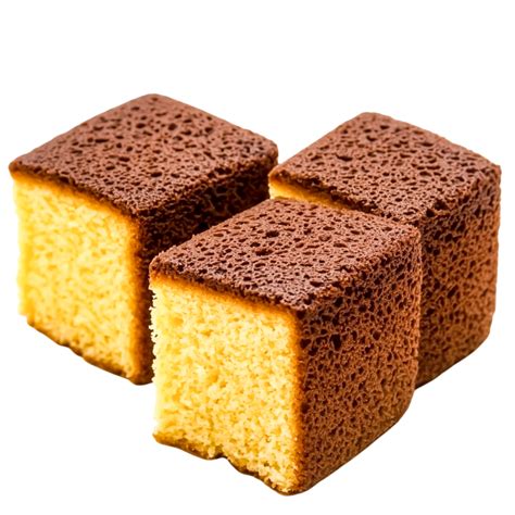 Three Squares Of Deliciously Moist Chocolate And Vanilla Cake Slices