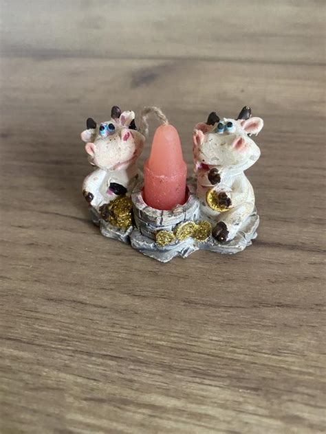 Маленькая статуэтка сувенир полистоун подсвечник со свечой денежные коровки — цена 25 грн в