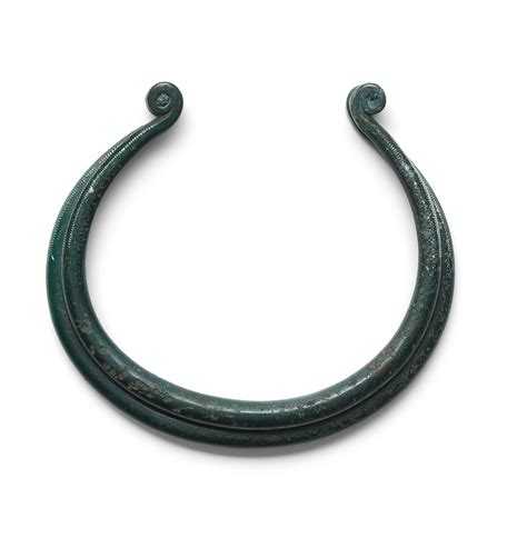 bonhams two european bronze torcs with spiral terminals