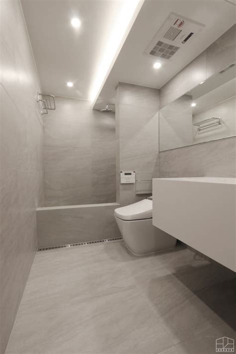 호텔 부럽지않은 심플하고 럭셔리한 집 48평 아파트 리모델링 홍예디자인 호미파이 And Homify 욕실 인테리어 디자인 욕실 타일 디자인 미니멀리스트 욕실 디자인