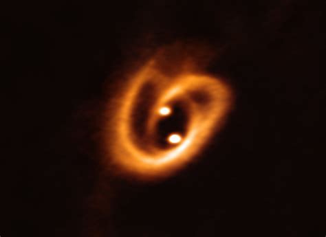 Bad Astronomy ALMA Sees The Twisted Birth Of A Binary Star System