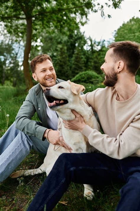 A Bearded Gay Couple Enjoys A Stock Photo Image Of Labrador Handsome