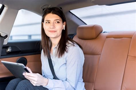 Free Photo Brunette Businesswoman Inside A Car