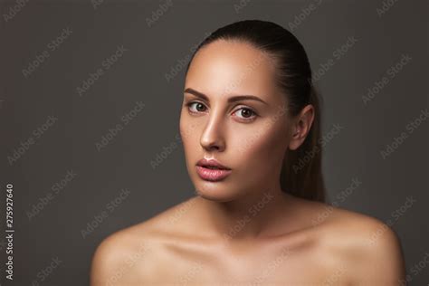 Beauty Portrait Of Female Face With Natural Perfect Skin Model With