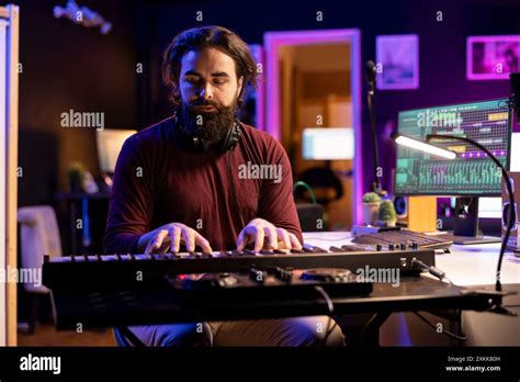 Skilled Producer Creating New Music On Piano Midi Controller Working