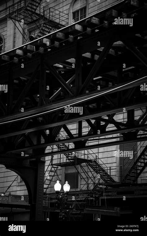 L Train Railway Line Pass By A Building With Fire Escape Staircase