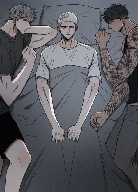 Two Men Standing Next To Each Other With Tattoos On Their Arms And