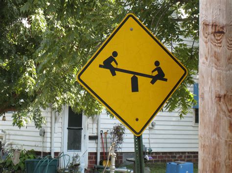 Teeter Totter Crossing Seriously Wouldn T A Slide Be A More Appropriate Picture For A Playground