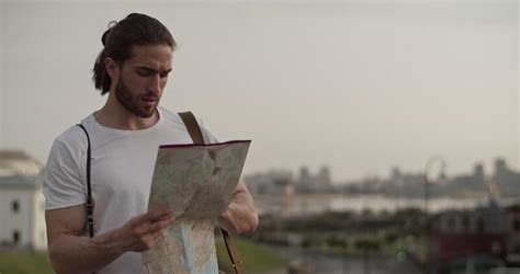 Confused Male Tourist Checking Map During Trip 54132815 Stock Video At Vecteezy