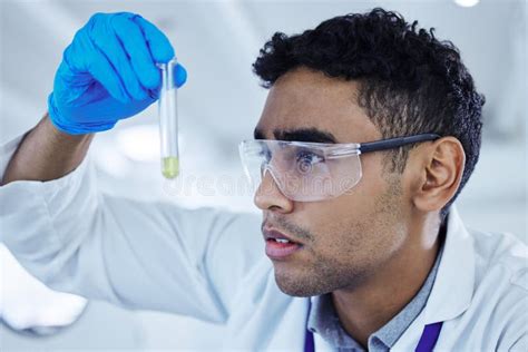 Man Science And Chemical In Test Tube For Investigation Solution Or