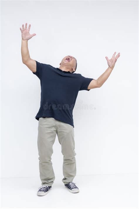 Full Body Portrait Of A Middle Aged Asian Man With A Nonchalant Pose