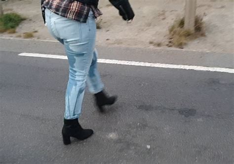 Public Wetting And Rewetting Tight Blue Jeans And Leather Jacket
