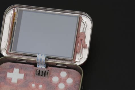 Raspberry Pi Gaming Console Fits Inside Recycled Altoids Mint Tin