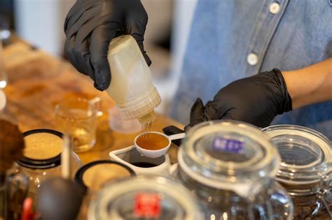 Premium Photo Midsection Of Person Working In Container
