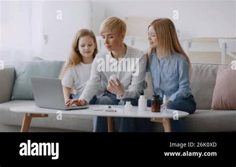 A Mother Teaches Her Two Daughters About Skincare Products While