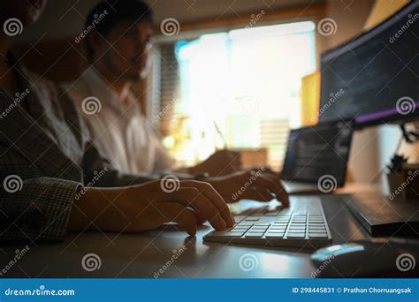 Software Developers Team Programming On Desktop Computer In Share Office Space Stock Image