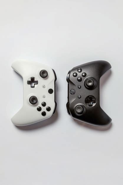 Premium Photo White And Black Two Joystick Gamepad Game Console Isolated On White Background