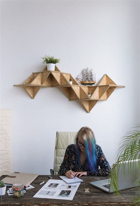 Pretty Woman Writing In Notepad At Workplace By Stocksy Contributor Milles Team Stocksy