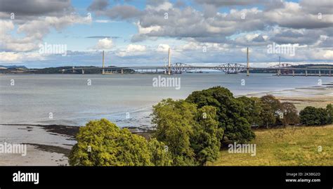 View Along The Forth River Near Edinburgh In Scotland With The Three Forth Bridges In The