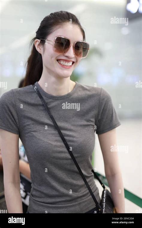 Chinese Model He Sui Arrives At The Shanghai Hongqiao International