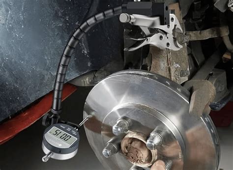 Check Rotor Run Out With A Clamping Dial Indicator