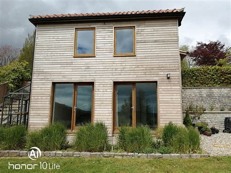 Hillside Garage Conversion With Brimstone Sycamore Cladding Vastern