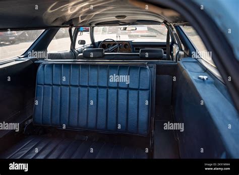 Closeup Interior View Of Classic Long Station Wagon With Wood Veneered