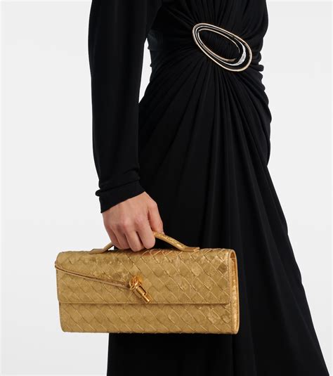 Andiamo Intrecciato Metallic Leather Clutch In Gold Bottega Veneta