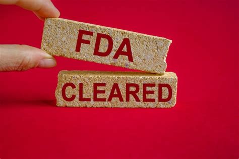 Premium Photo Fda Food Drug Administration Cleared Symbol Concept Red Words Fda Cleared On