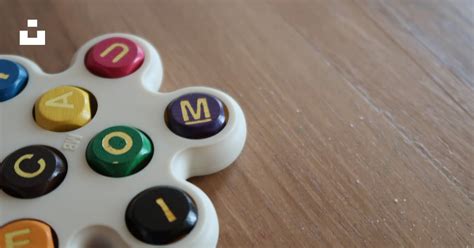 White Yellow Green And Orange Game Controller Photo Free Games Image