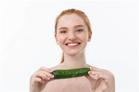 Premium Photo Cheerful Happy Beautiful Girl With Cucumber On Her Hand