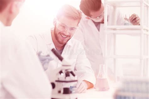 Background Image Science Team In The Lab Stock Photo Image Of Discovery Glasses