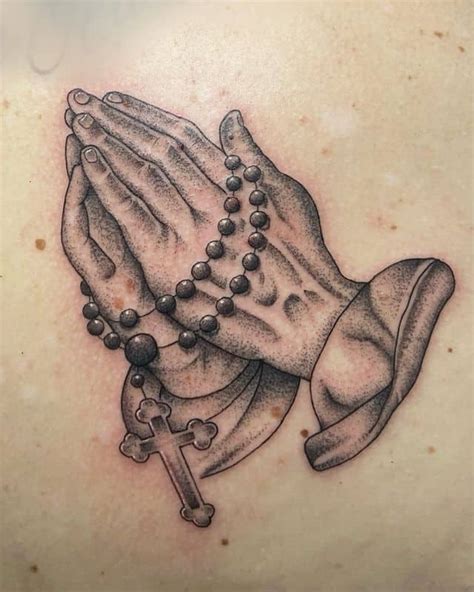 Praying Hands Tattoos On Hands Meaning Style And Placement Guide