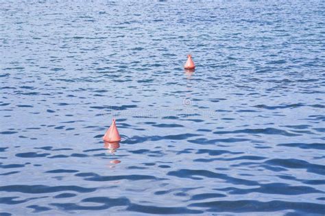Plastic Red Bouy On A Calm Lake Concept Image With Copy Space Stock