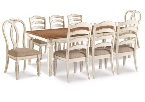 Realyn Dining Table And 8 Chairs