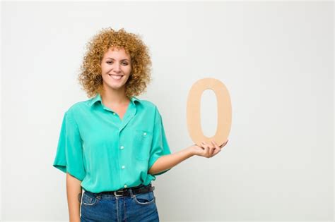 Premium Photo Portrait Of A Woman On A Grey Background