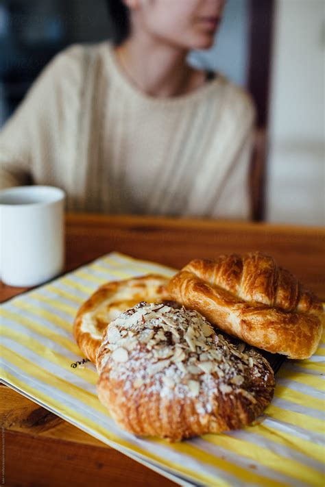 Girl Having Breakfast By Stocksy Contributor Luke Mallory Leasure