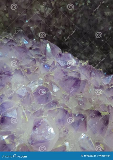 Vertical Closeup Of Beautiful Purple Amethyst Crystal Formations In An