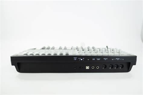 Rear View Of A Professional Audio Midi Controller With Connection Ports On White Background