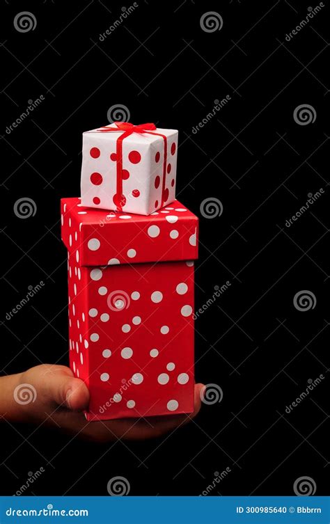 T Boxes On Palm Of Hand Isolated On Black With Copy Space Stock