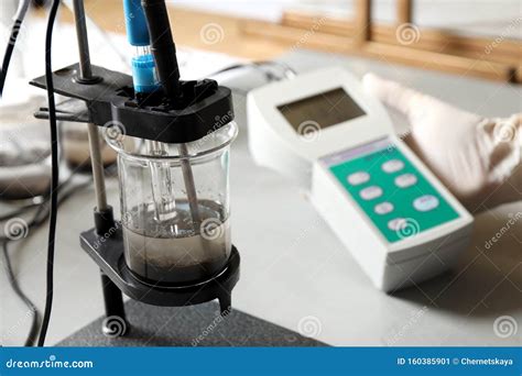 Scientist Measuring Acidity And PH Of Soil At Table Laboratory Analysis Stock Image Image Of