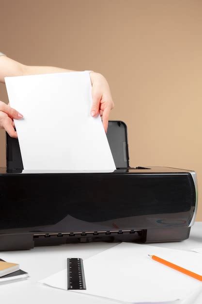 Premium Photo Woman Using The Printer To Scanning And Printing Document