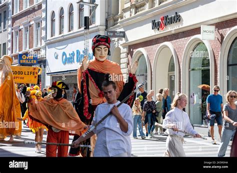 Kosmos Good Life Parade Showing A Massive Doll In A Crowd In Aarhus