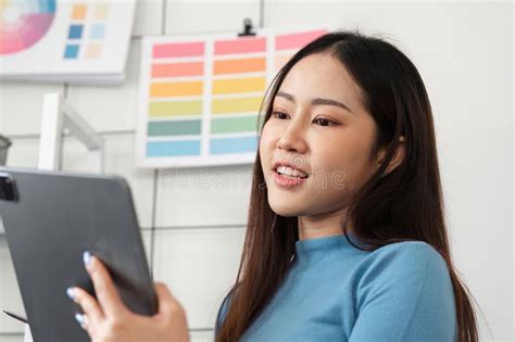 Interactive Color Application A Designer Engaging With Digital Tools To Finalize Color Choices