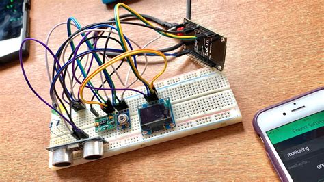 monitor suhu mlx90614 dan jarak hc srf04 oled nodemcu esp8266 arduino