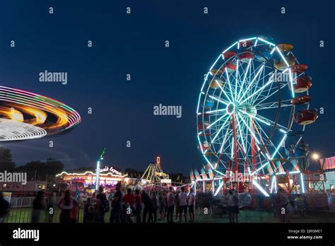 The Wonder Shows Midway Illuminated At Night At The Harvest Festival In Winkler Manitoba
